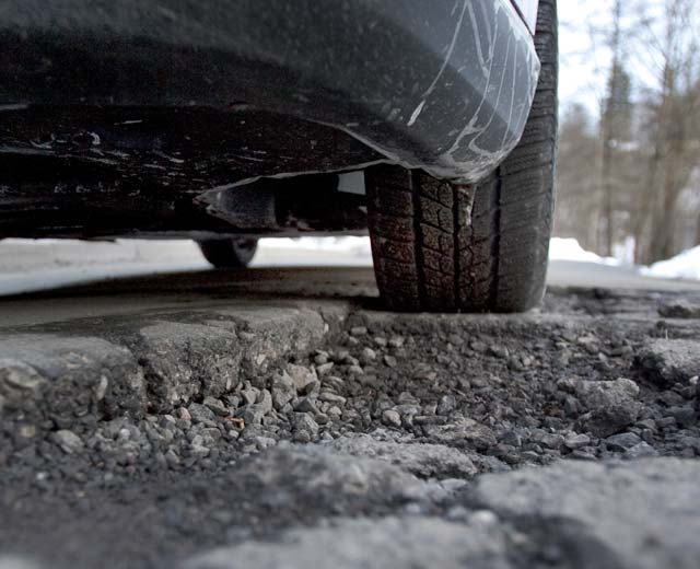 Does Hitting a Pothole Damage Tires or Suspension? - Les Schwab